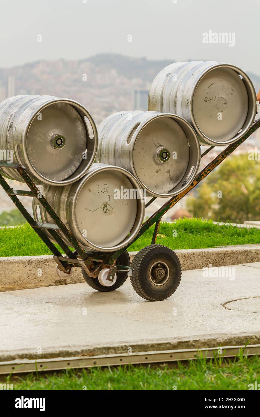 Vertical shot of beer cans stacked on a metal wheelbarrow Stock Photo ...