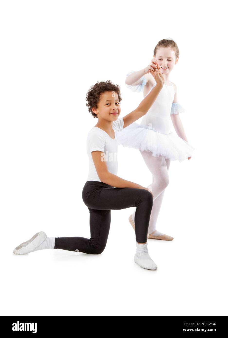 Interracial children dancing together Stock Photo - Alamy