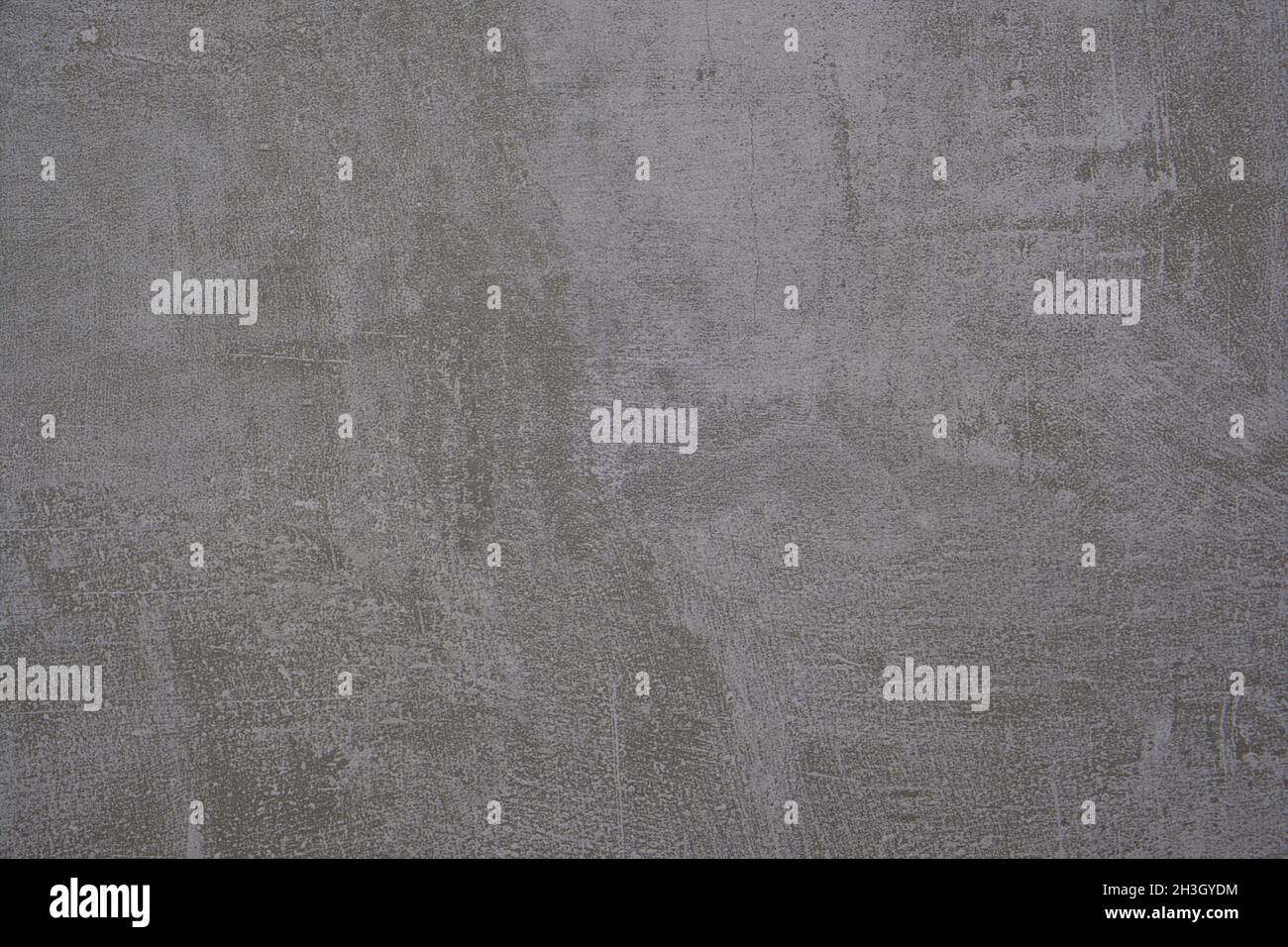 Close-up shot of a gray grunge plaster stucco concrete wall texture for ...
