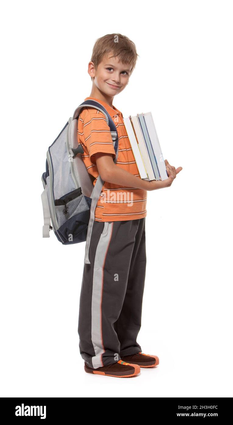 Boy holding books Stock Photo - Alamy