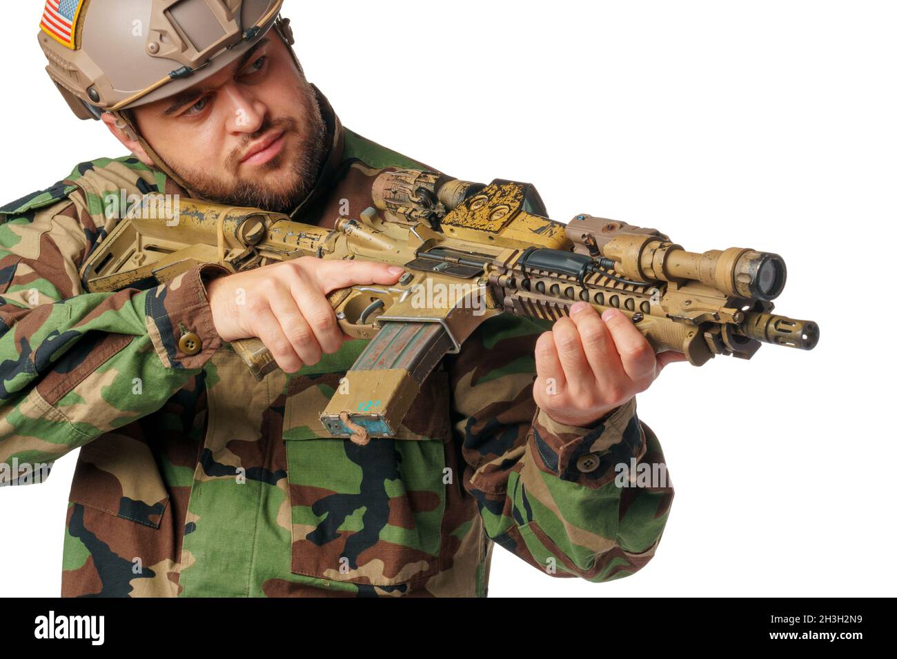 Airsoft player aiming with his rifle isolated on white Stock Photo - Alamy