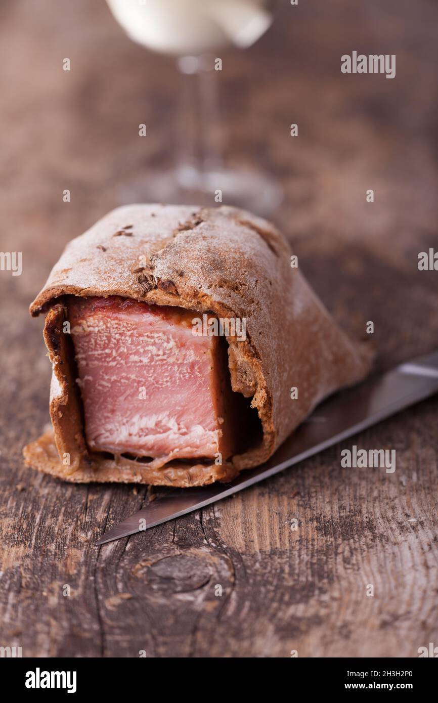 Ham baked in bread dough Stock Photo - Alamy