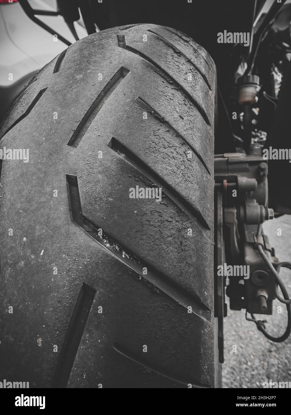 Closeup of the slightly worn out tire of the motorcycle Stock Photo - Alamy