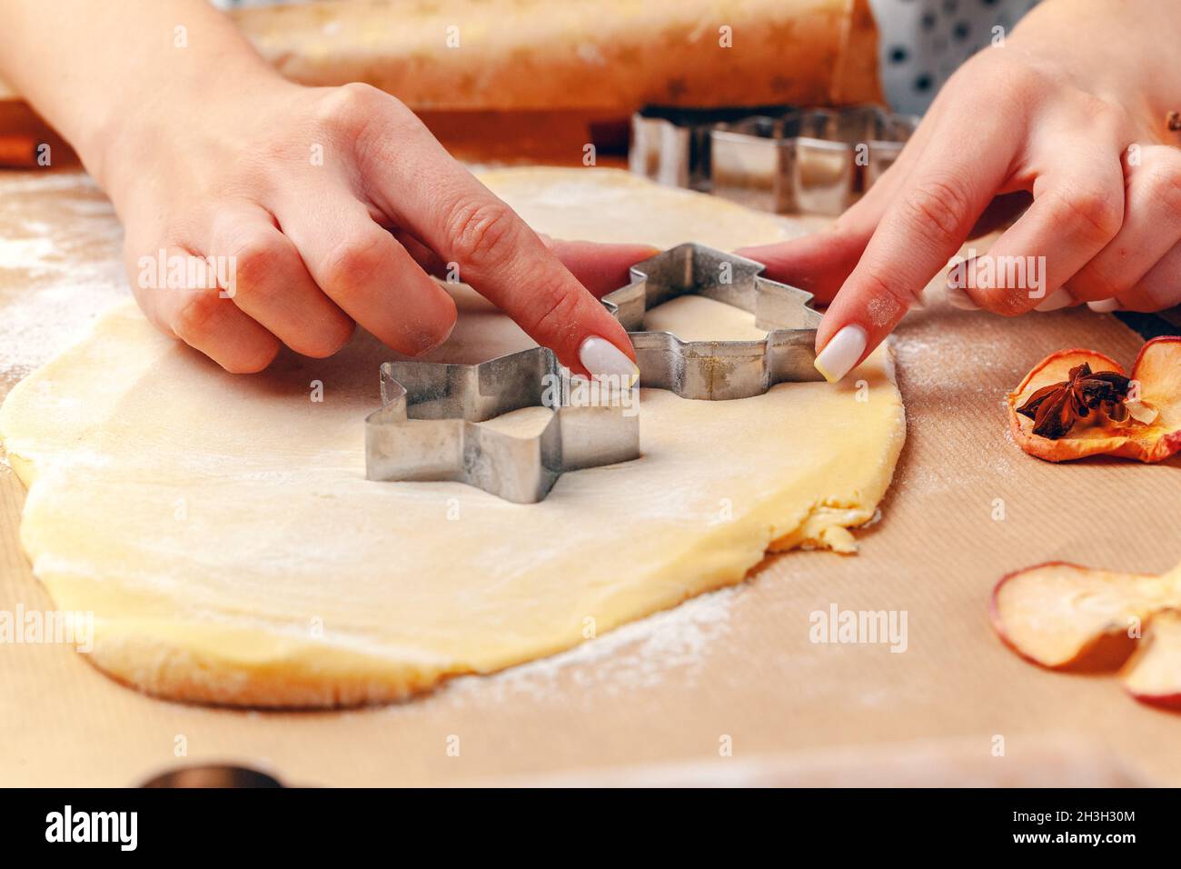 female hands making cookies from fresh dough at home Stock Photo - Alamy