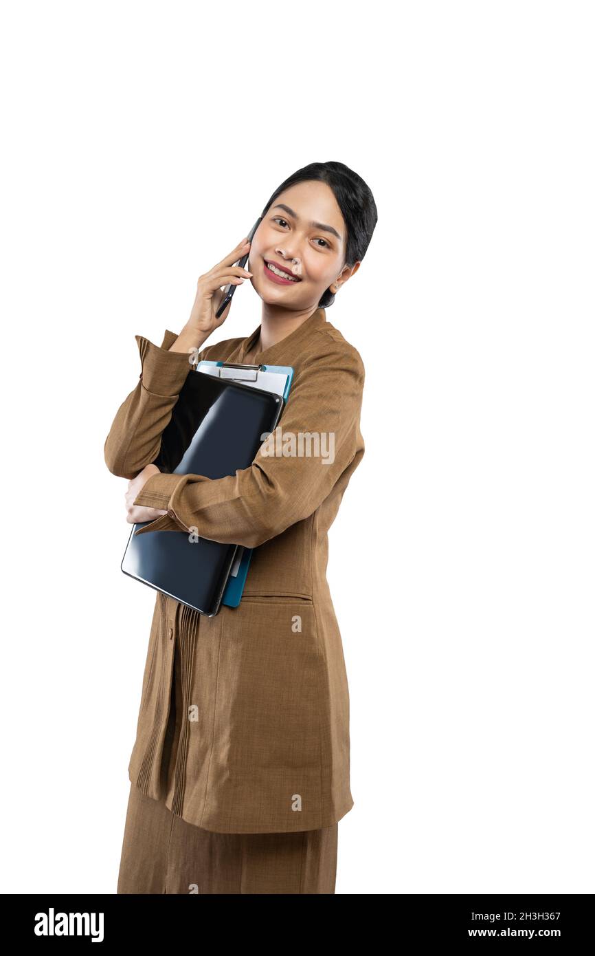 Beautiful female office worker makes hi-res stock photography and ...