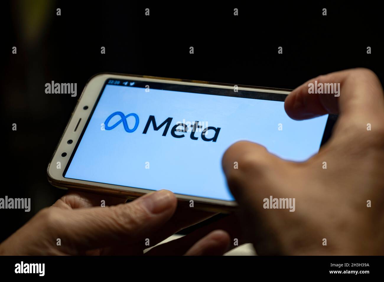 In this photo illustration the new Facebook Meta logo is seen on a ...