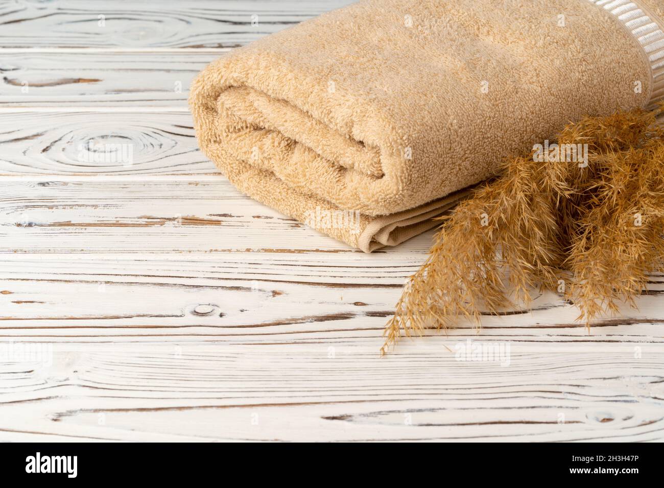 Household work. Clean towel ready to use Stock Photo - Alamy