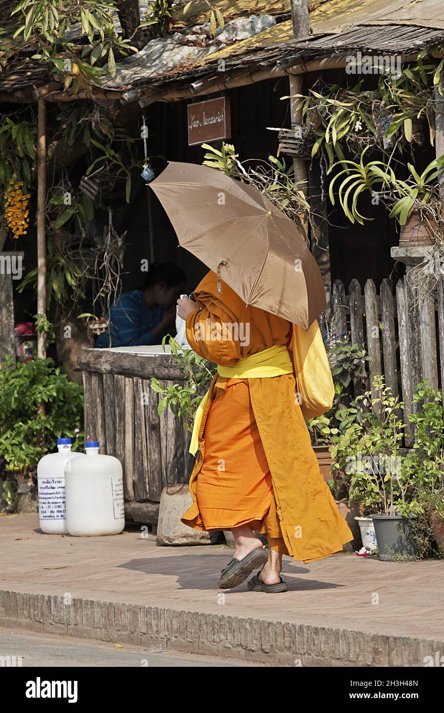 Buddhist monk running hi-res stock photography and images - Alamy