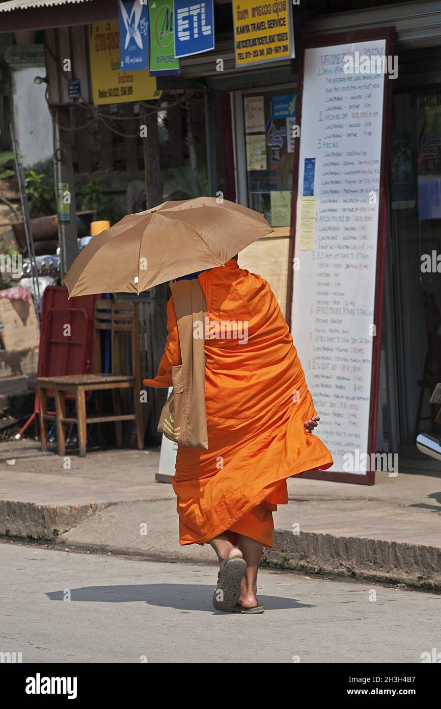 Buddhist monk running hi-res stock photography and images - Alamy