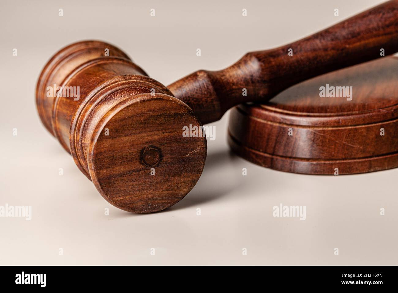 Wooden judges gavel on table close up Stock Photo - Alamy