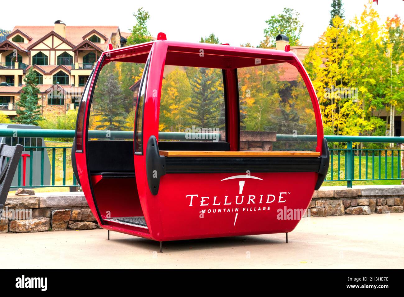 Empty red gondola cable car in Mountain village used as photo spot ...