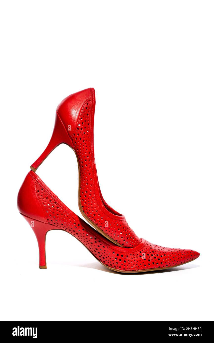 Female red high heel shoes on white background Stock Photo - Alamy