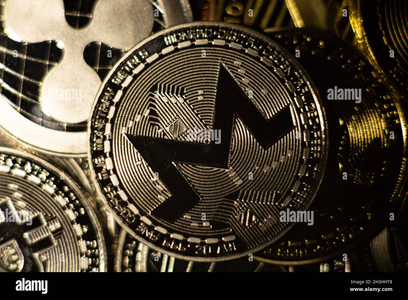 Horizontal view of cryptocurrency tokens including Monero XMR, Bitcoin ...