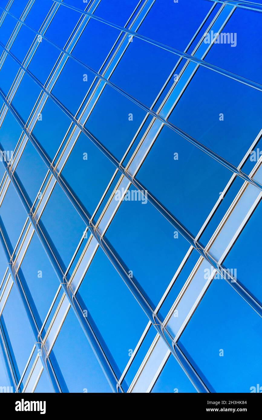 Modern blue glass wall of skyscraper Stock Photo - Alamy