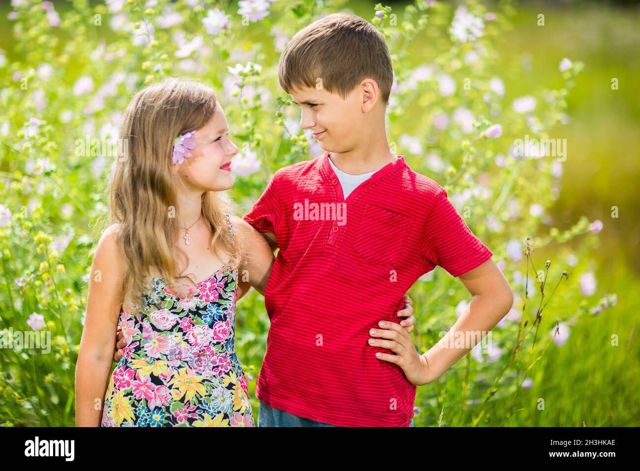 Adorable happy kids outdoors on summer day Stock Photo - Alamy