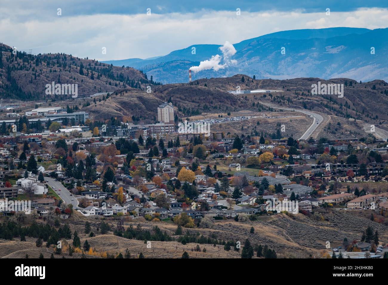 View of Domtar Pulp Mill smokestack and Greater Kamloops. The mill uses ...