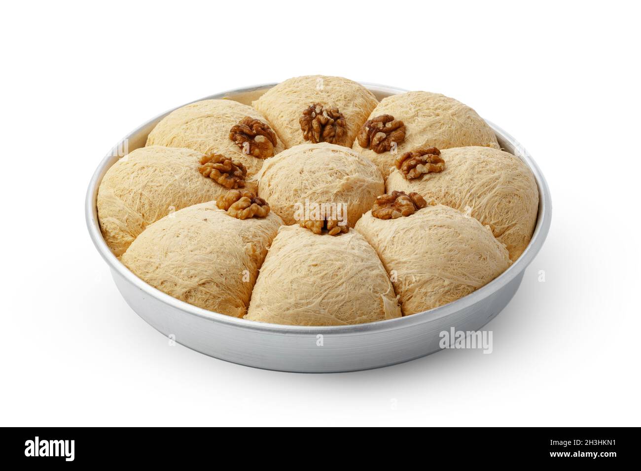 Turkish dessert halva in metal tray isolated on white Stock Photo - Alamy