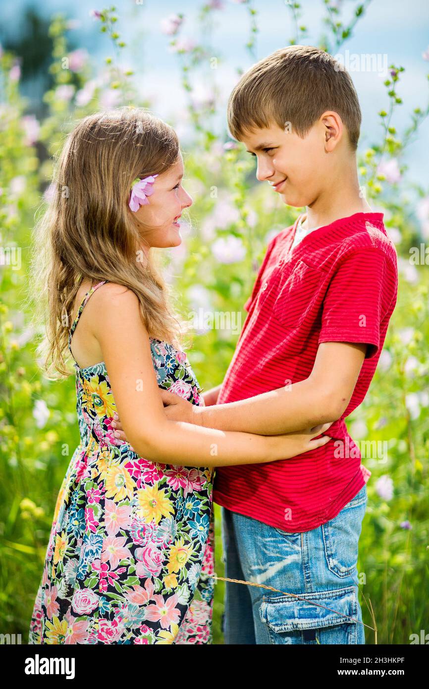 Adorable happy kids outdoors on summer day Stock Photo - Alamy