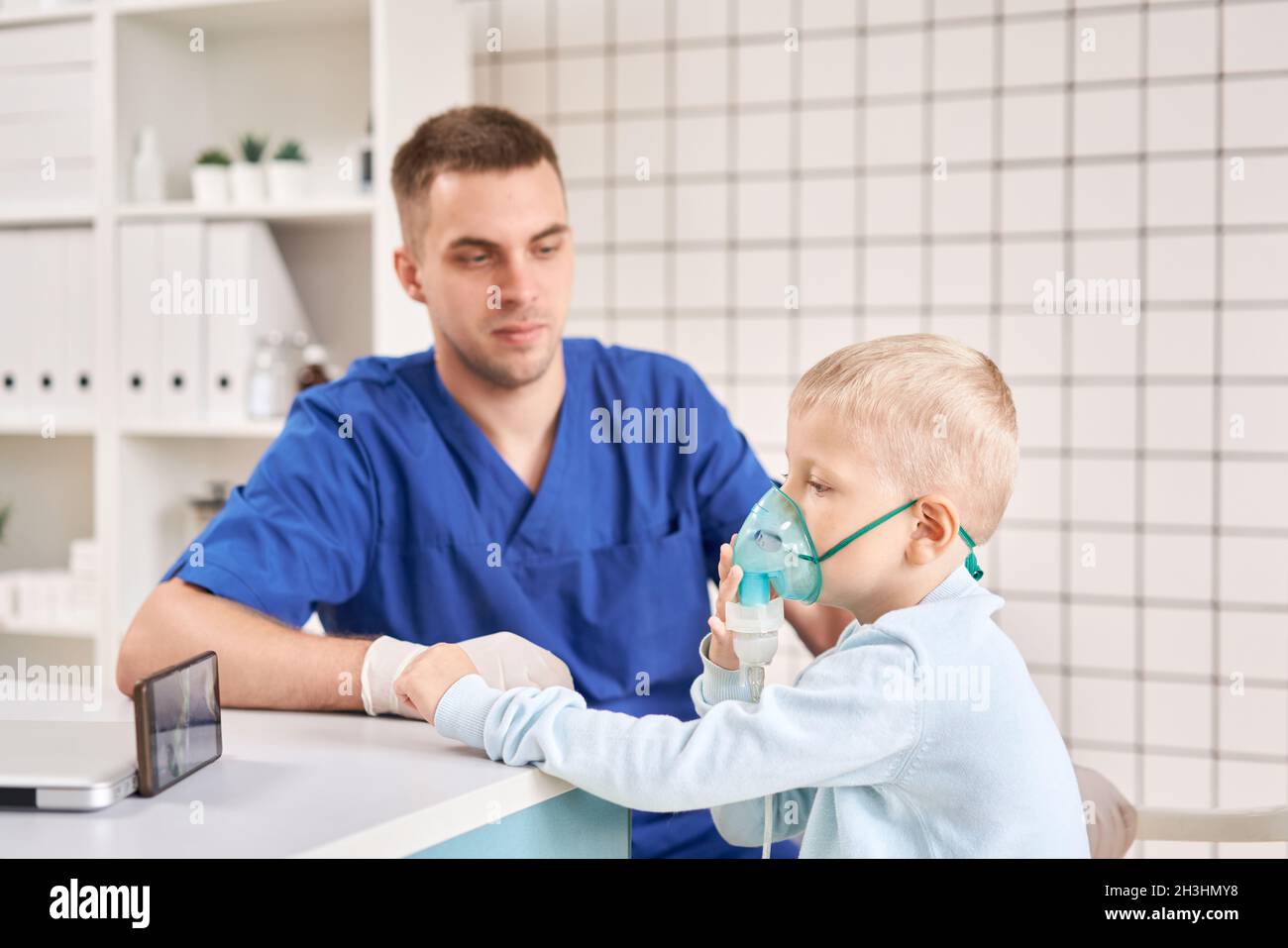 A pediatrician diagnoses lung disease and provides treatment. Breathe ...