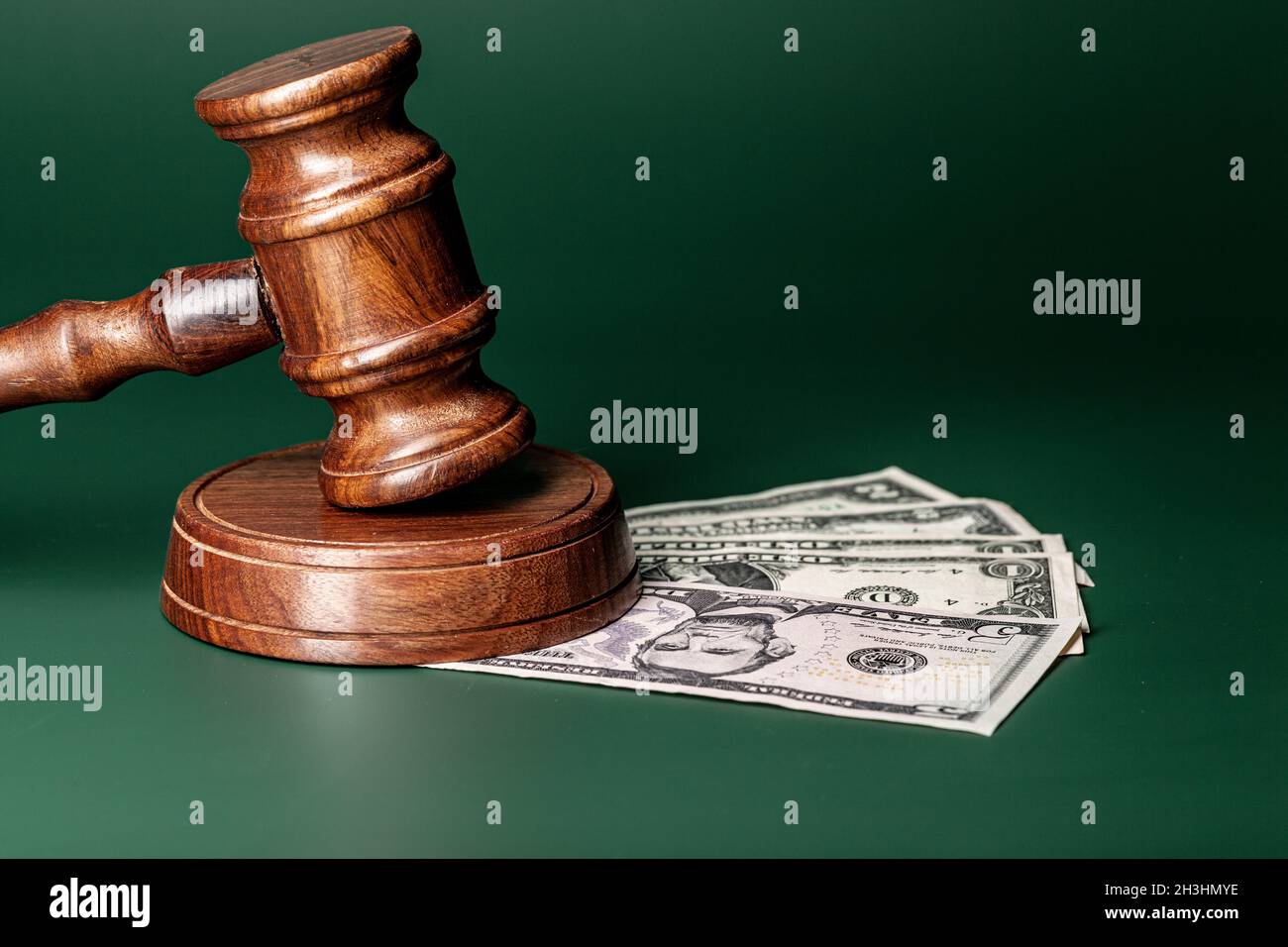 Law mallet and a stack of money Stock Photo - Alamy