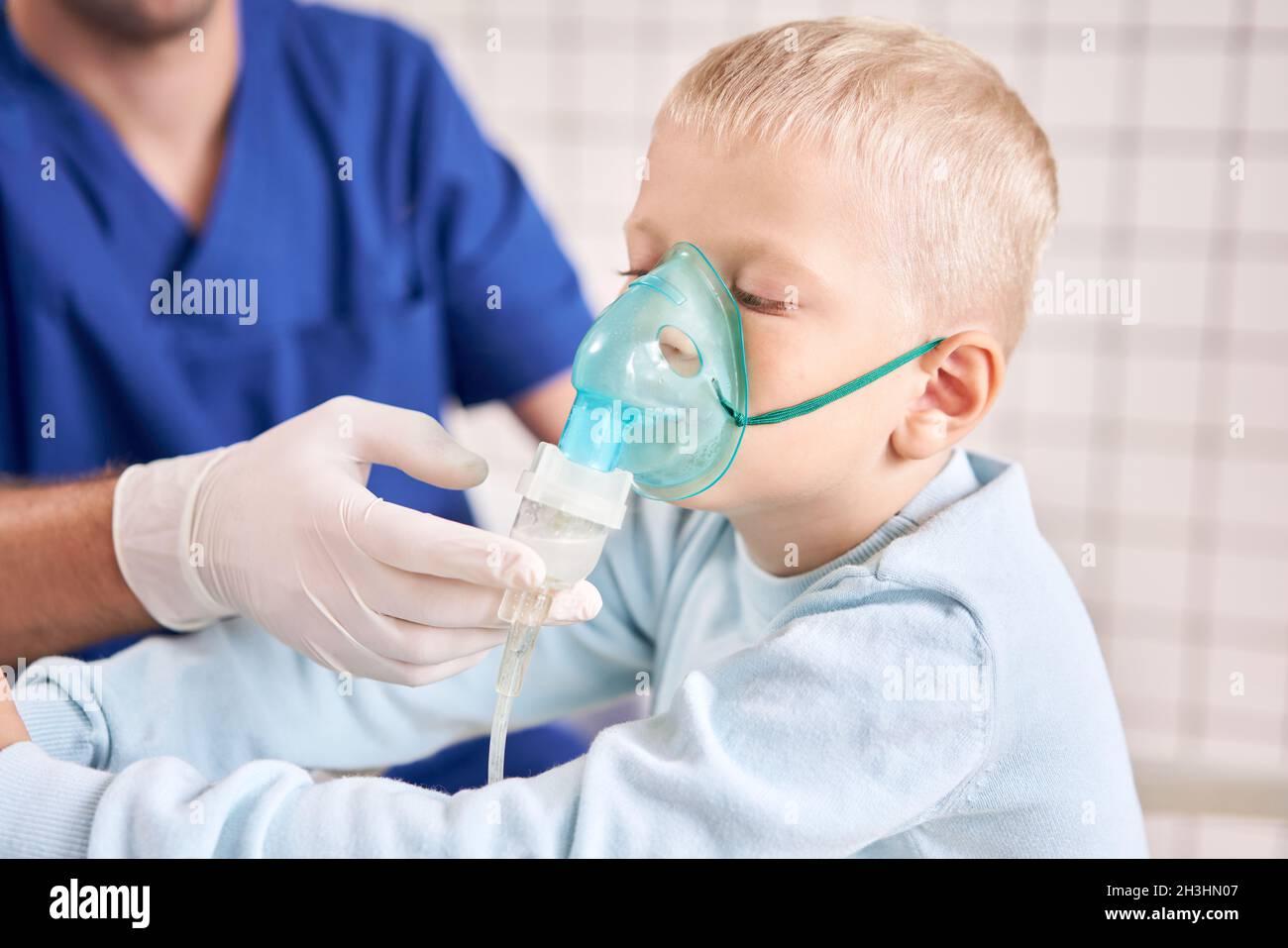 A pediatrician diagnoses lung disease and provides treatment. Breathe ...