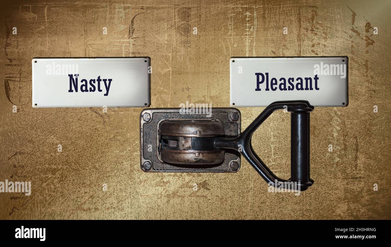 Street Sign the Direction Way to Pleasant versus Nasty Stock Photo - Alamy