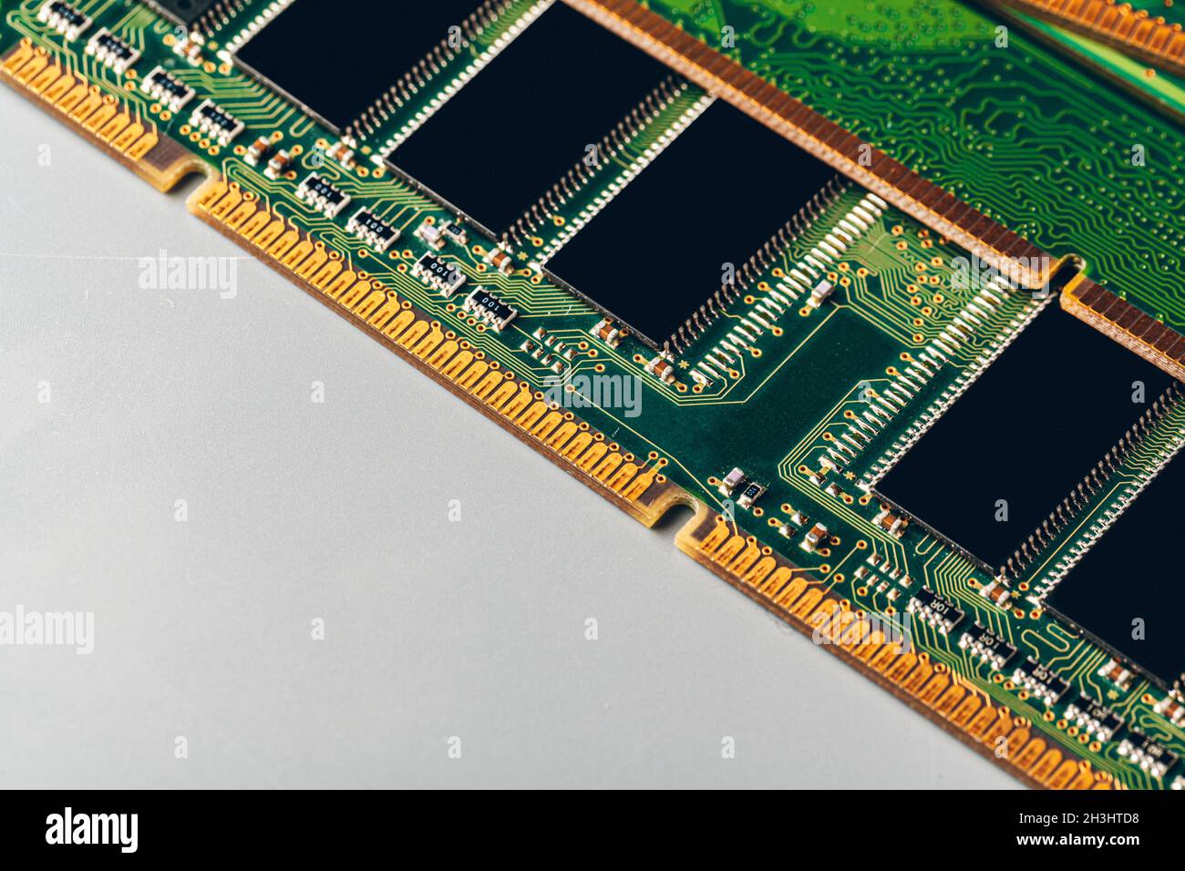 Green circuit board of a computer close up Stock Photo - Alamy