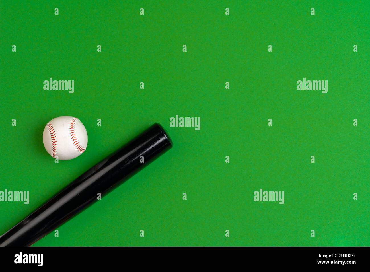 Baseball bat and ball, view from above Stock Photo - Alamy