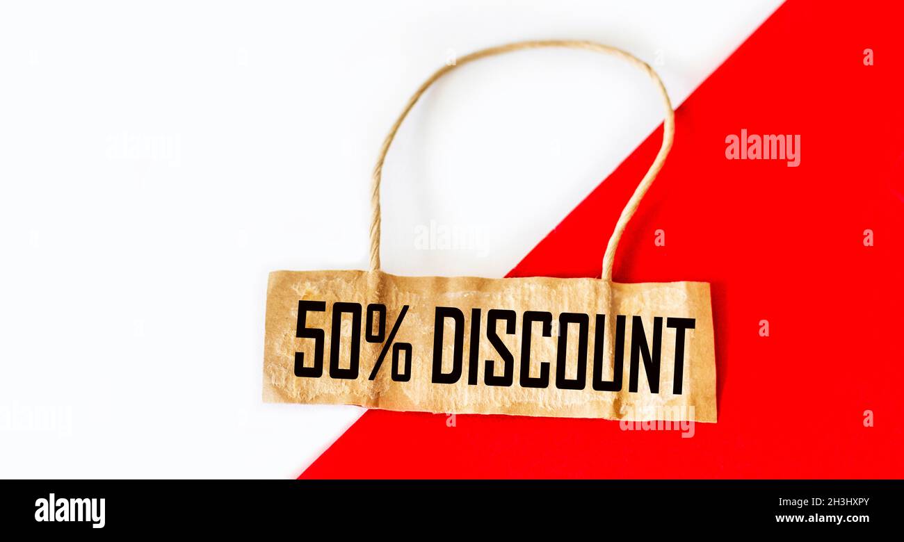 Label with a 50 percent discount sign on a white and red background ...