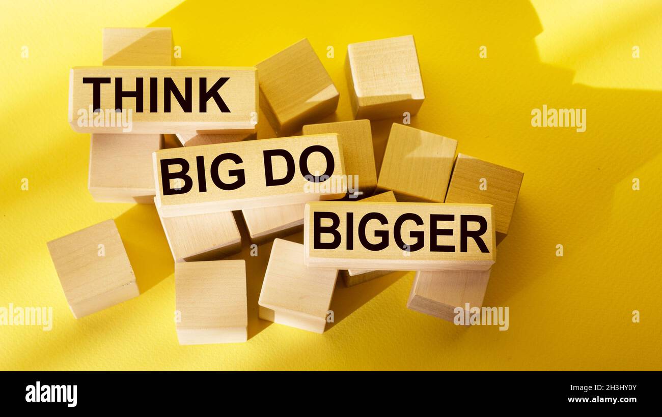 Think Big Do Big Text Written on Wood Blocks and Yellow Background ...
