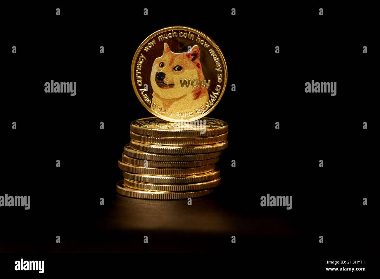 A pile of Dogecoin that has a gold color that is currently popular and ...