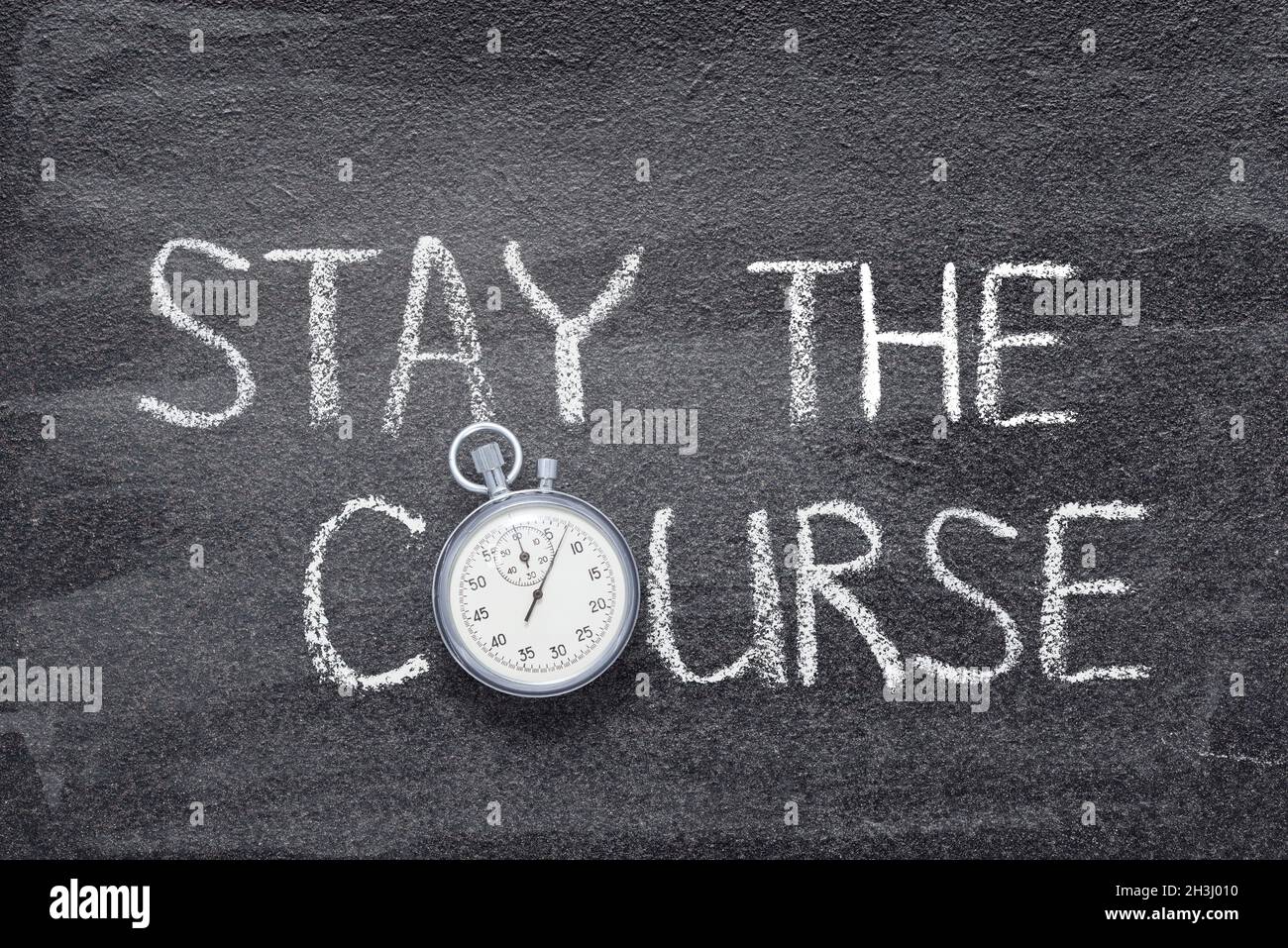 stay the course phrase written on chalkboard with vintage precise ...