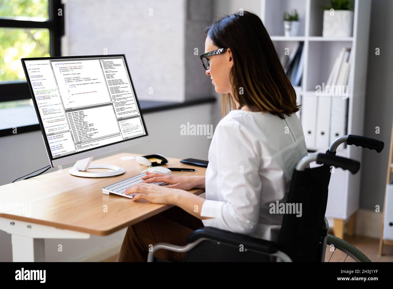 Programmer Woman With Disabilities Working. Software Coder Stock Photo ...