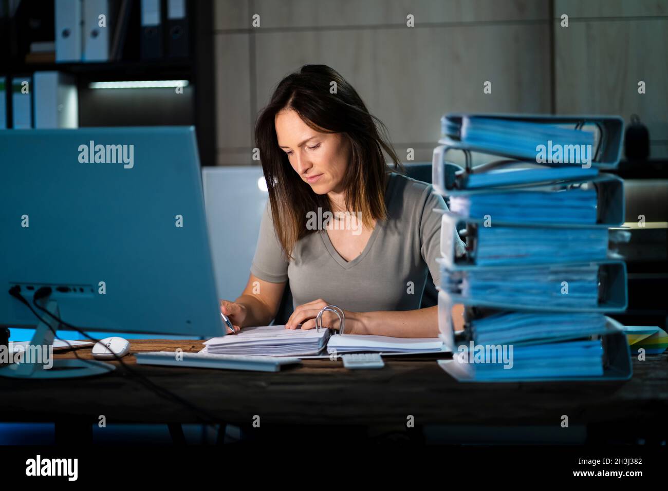 Invoice Documents Stack In Office. Accountant Overtime Stock Photo - Alamy