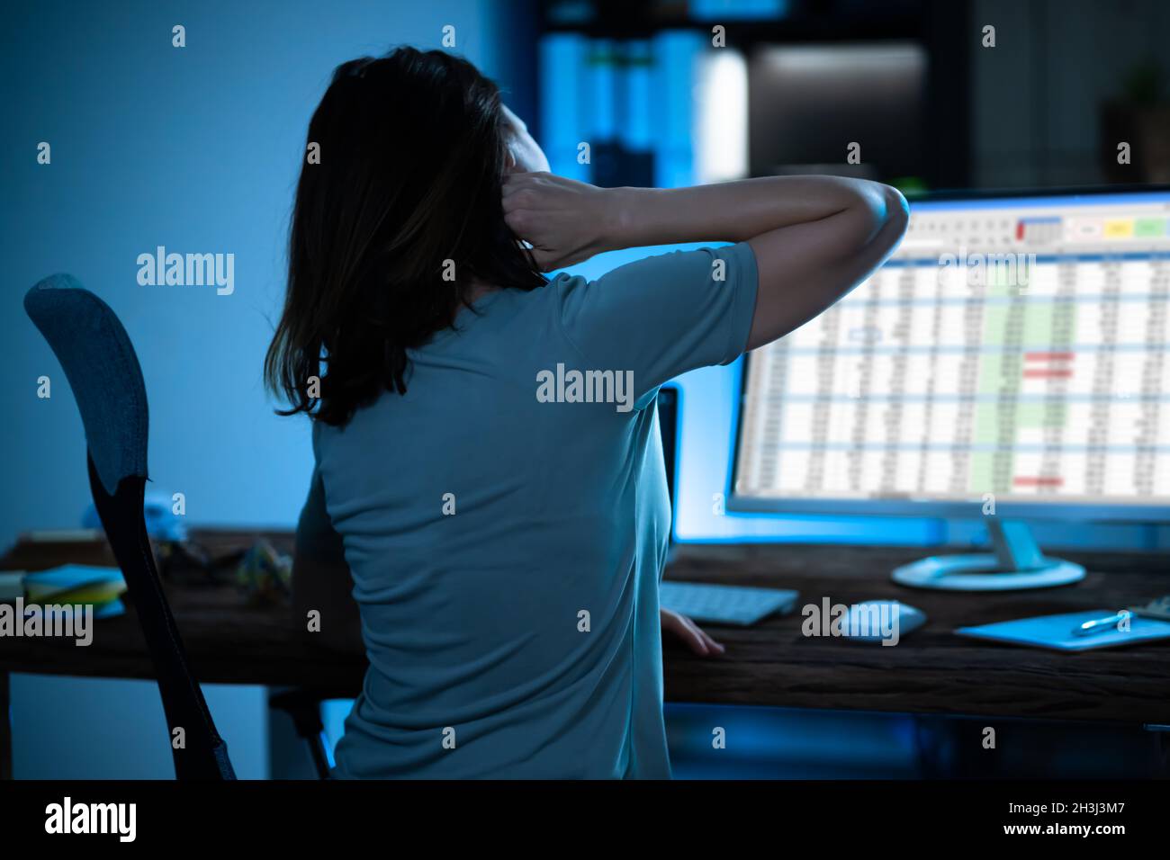 Back Pain Bad Posture Woman Sitting In Office Stock Photo - Alamy