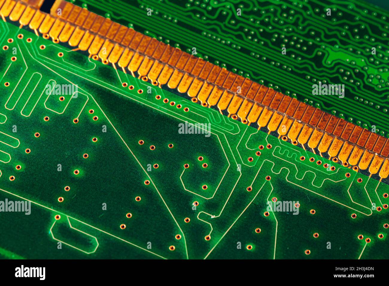 Green circuit board of a computer close up Stock Photo - Alamy
