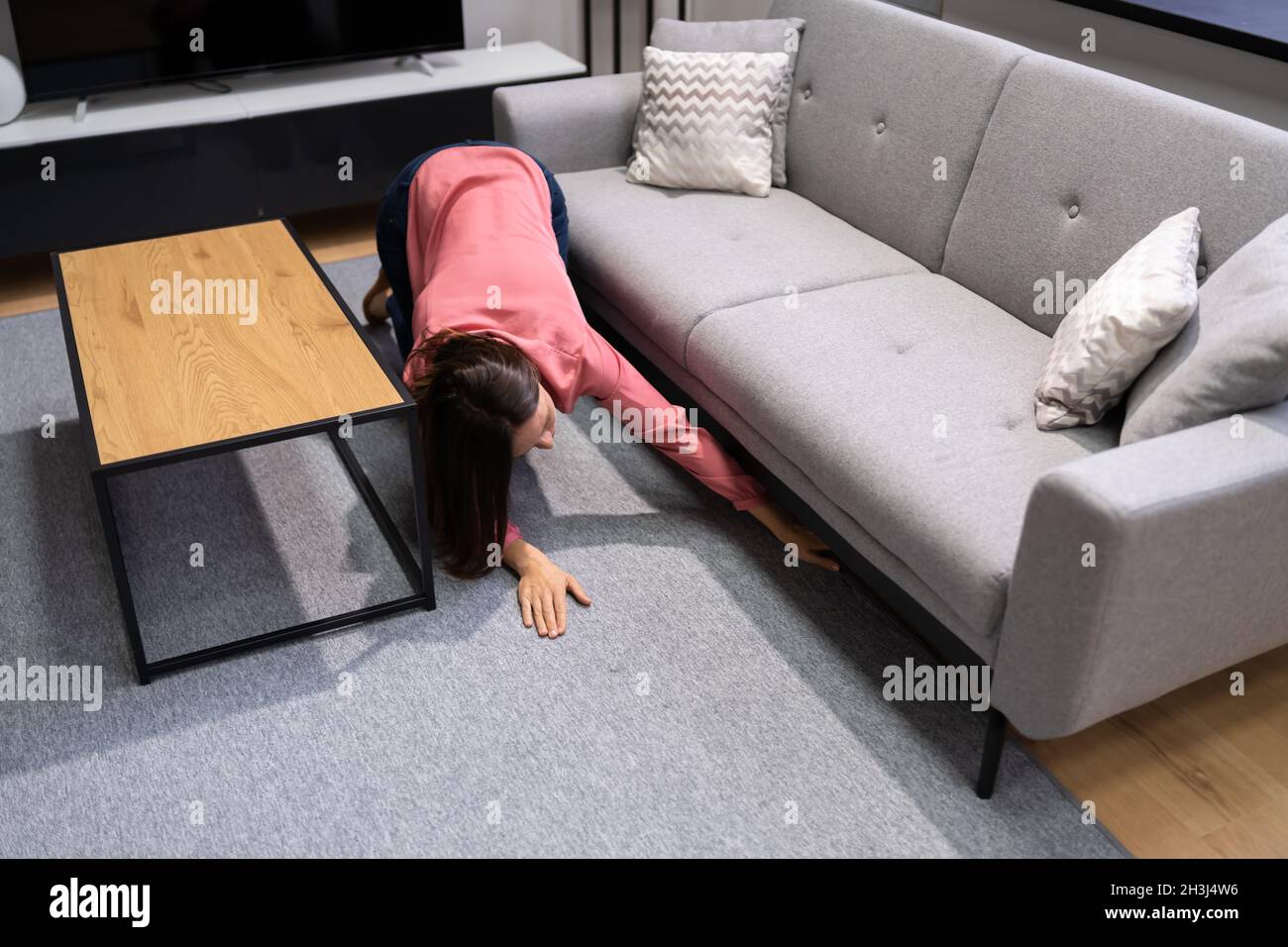 Lost Something Looking For Things. Searching Keys Stock Photo - Alamy