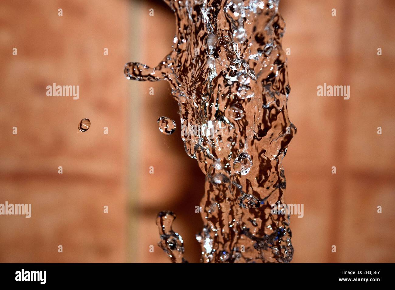 Selective of water splash in a bathroom Stock Photo - Alamy