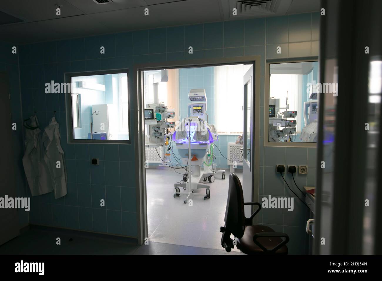 A newborn baby is treated in an incubator. Department of neonatal ...