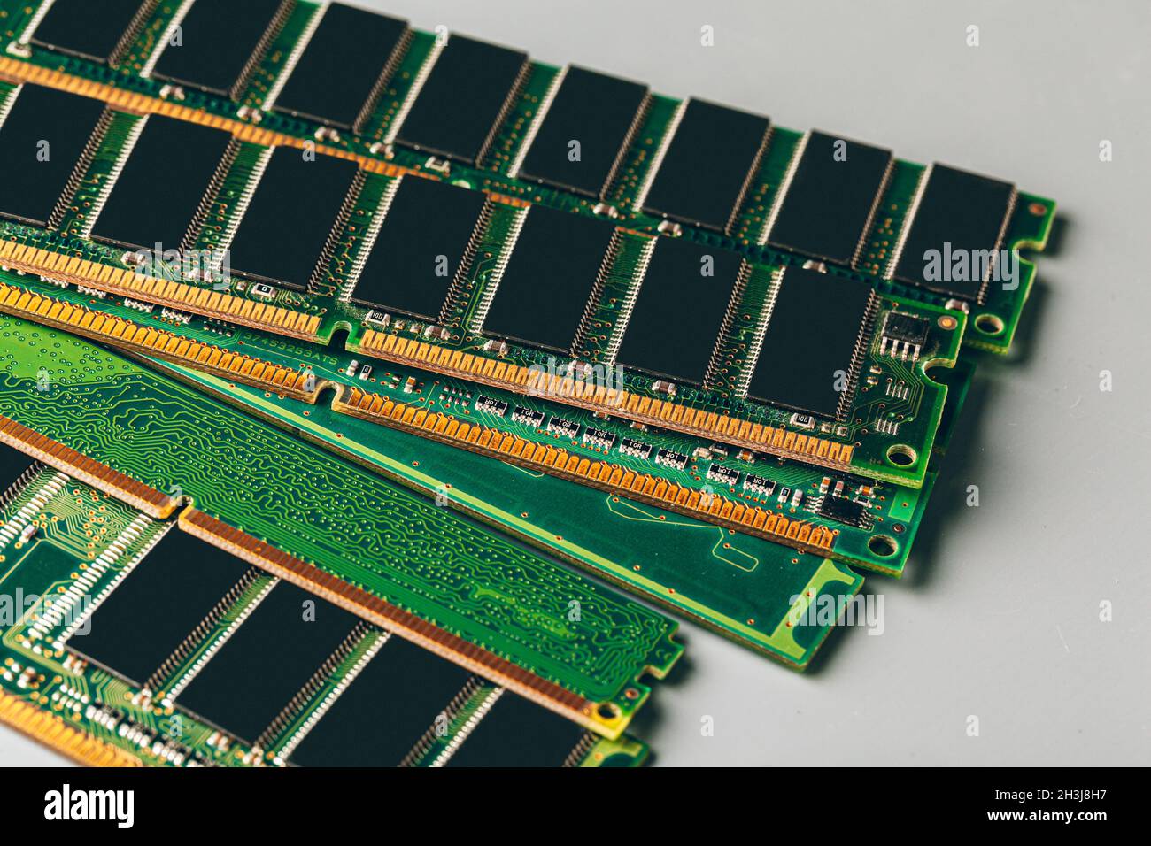 Green circuit board of a computer close up Stock Photo - Alamy