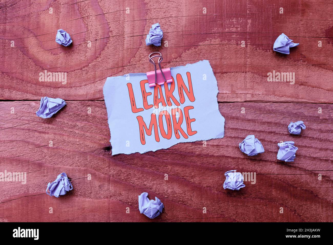 Hand writing sign Learn More. Business overview knowledge or skill ...