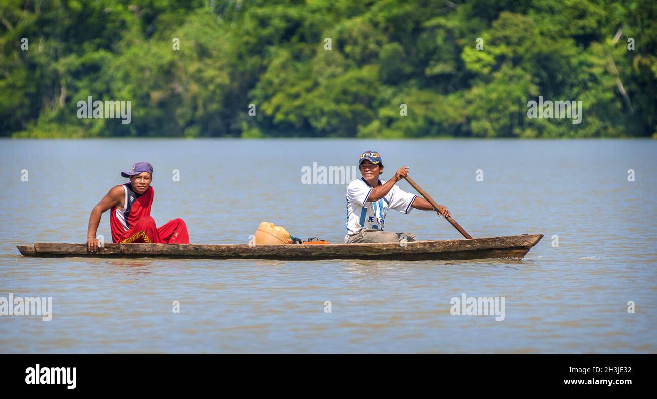 LORETO, PERU - JANUARY 02: Unidentified locals fishing in the river in ...