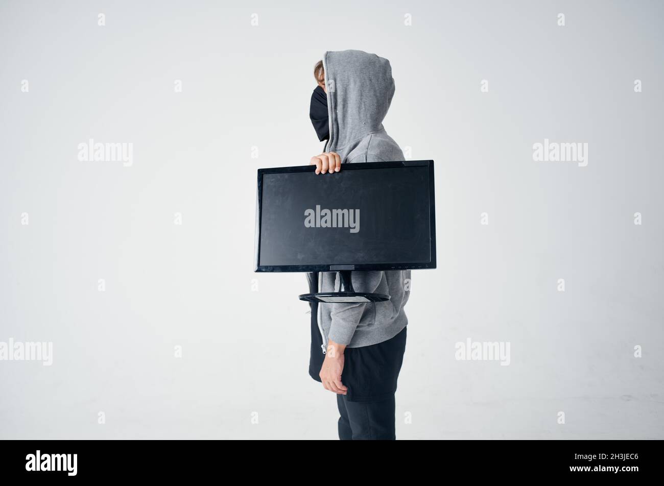 hacker stealth technique robbery safety hooligan light background Stock ...