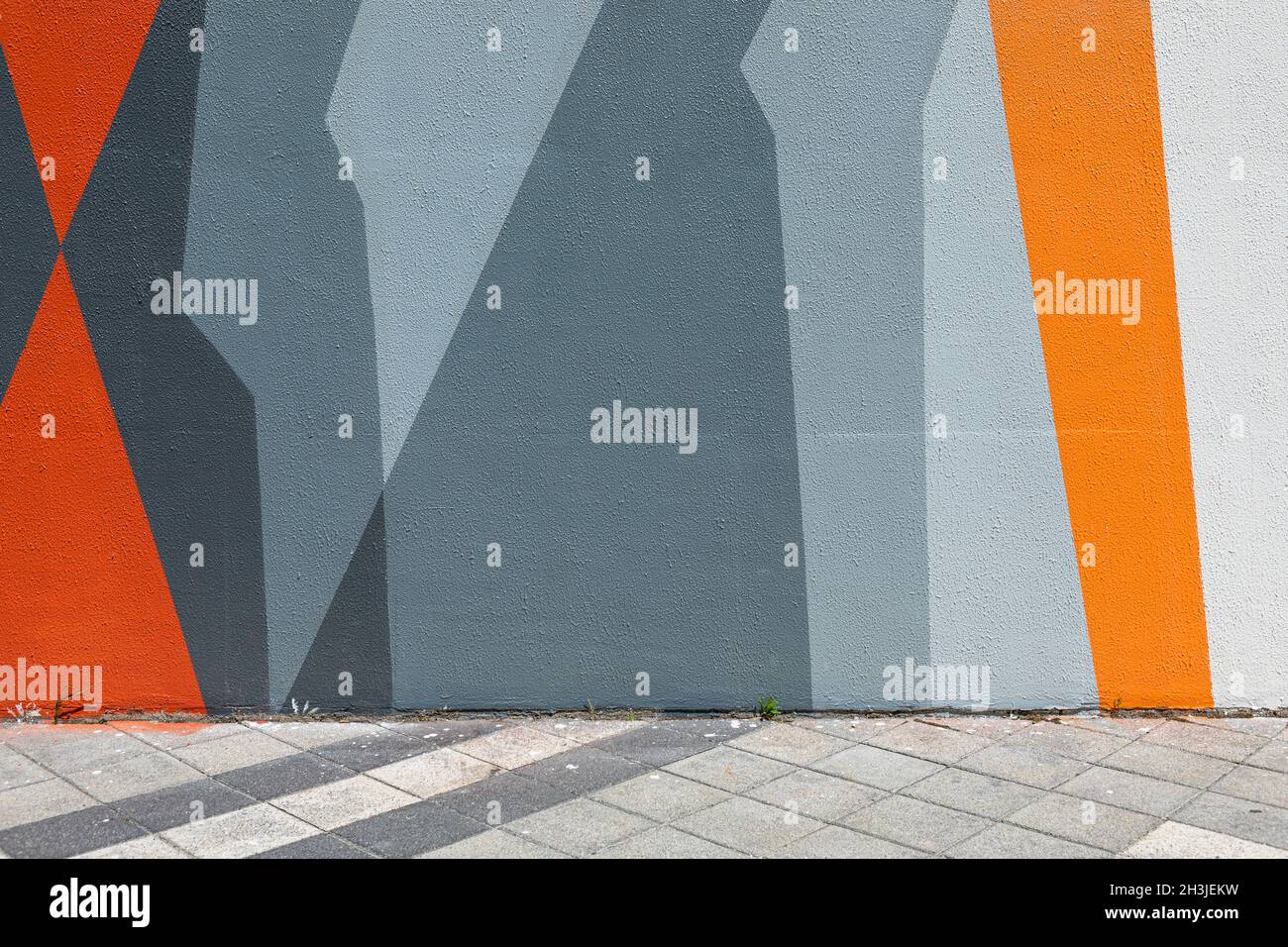 urban scene with empty street and colorful geometrical wall Stock Photo ...