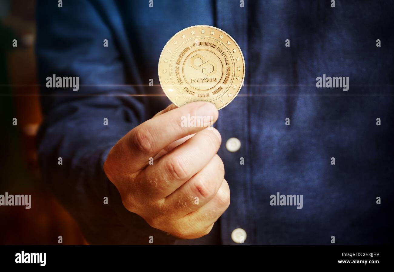 Polygon Matic cryptocurrency symbol golden coin in hand abstract ...