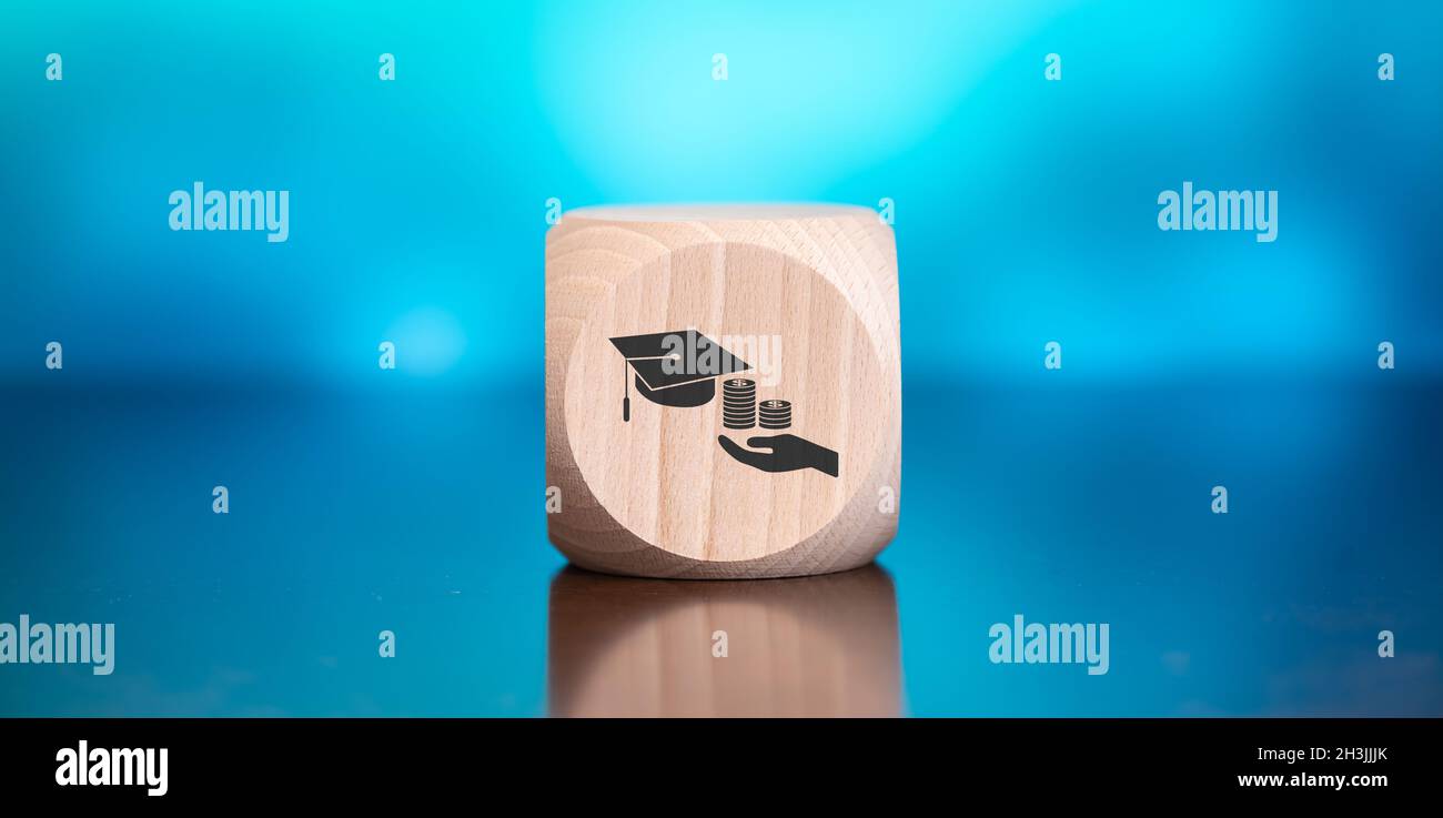 Wooden block with symbol of fafsa concept on blue background Stock ...