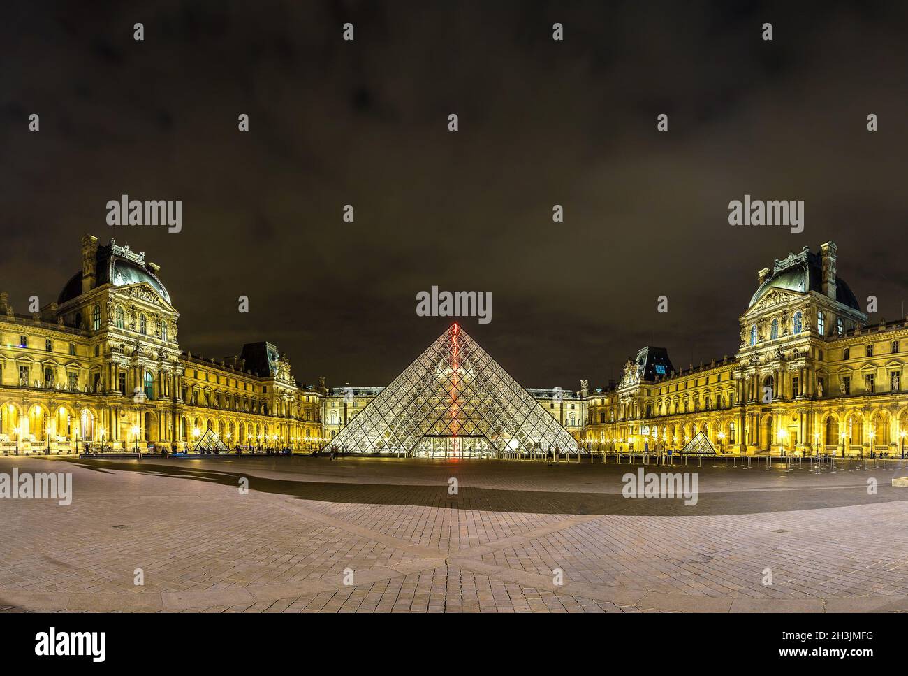 The Louvre at night in Paris Stock Photo - Alamy