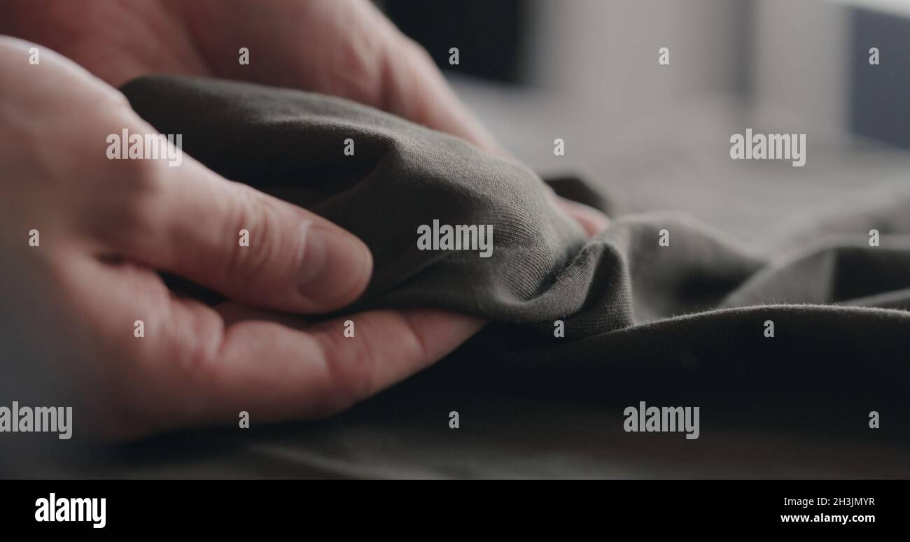 Finger touching cloth hi-res stock photography and images - Alamy