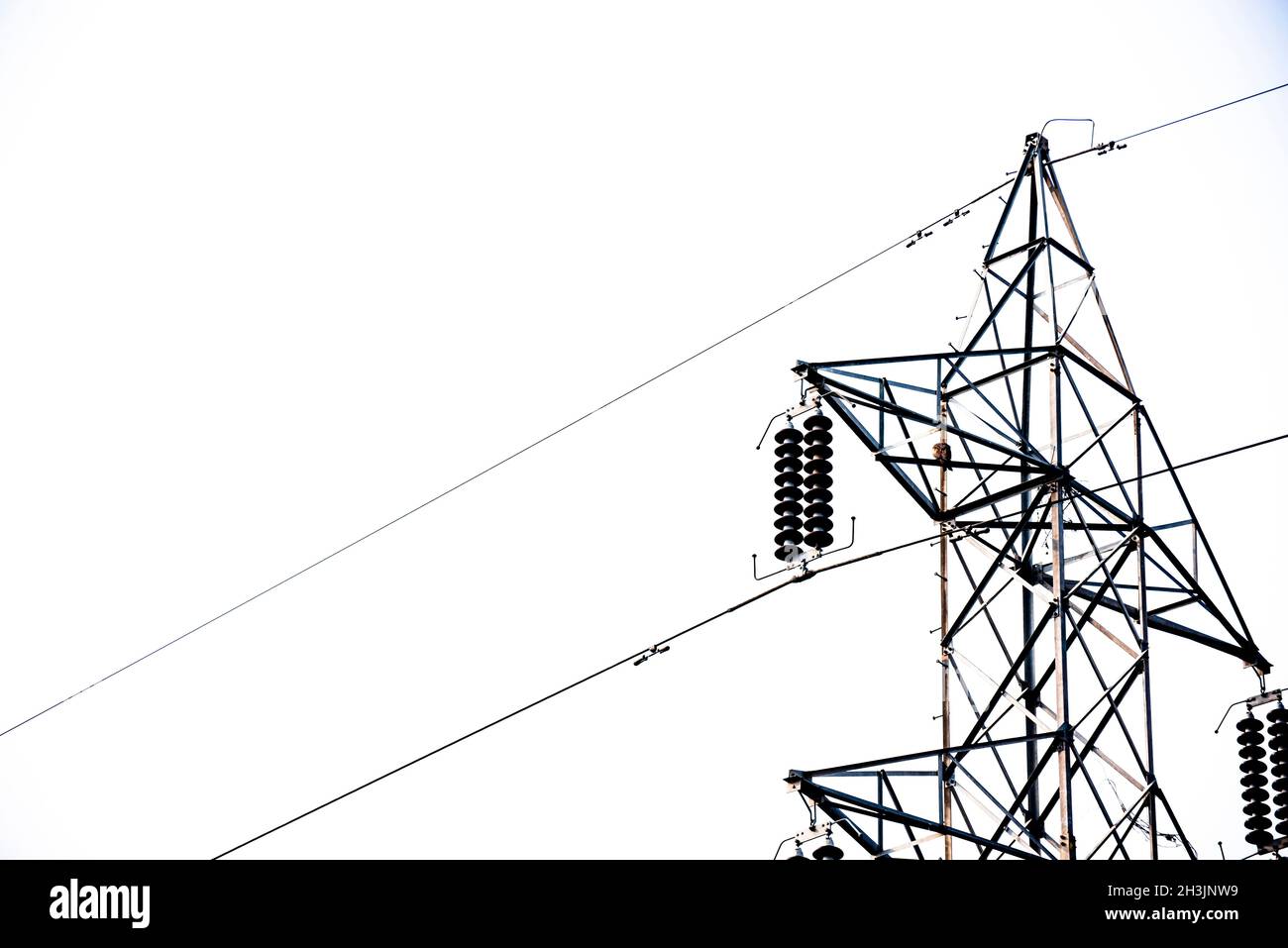 High-voltage electric power line against isolated white background ...