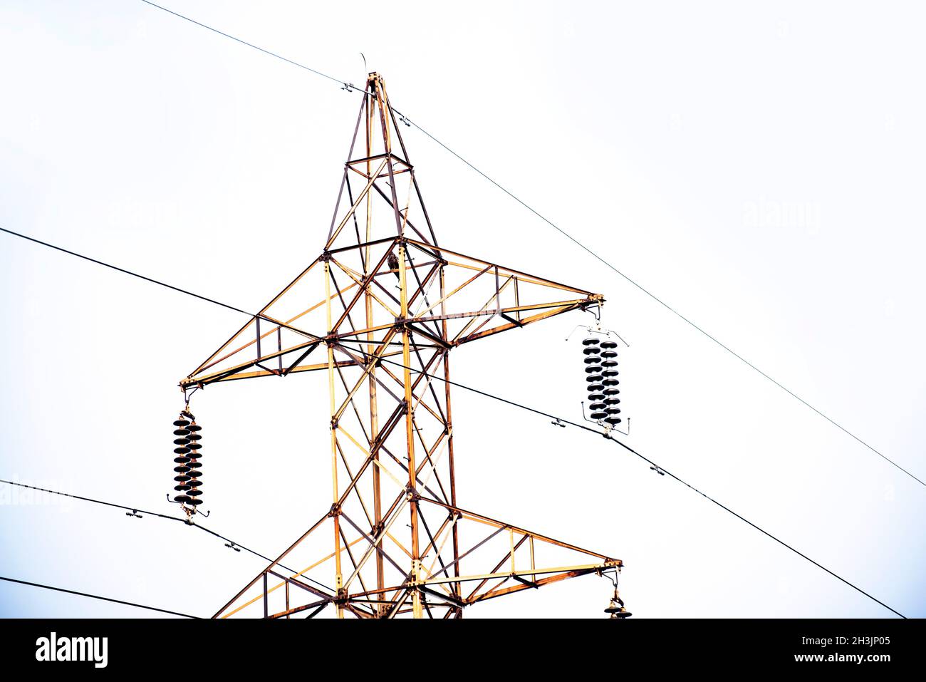 High-voltage electric power line against isolated white background ...